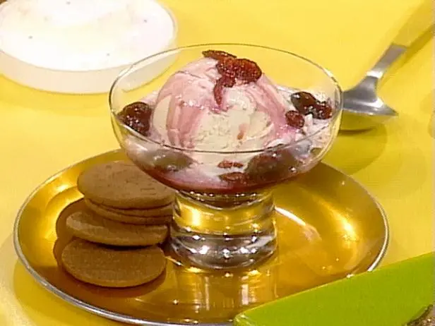 Warm Fruit Compote of Cherries, Orange and Cranberries Over Vanilla Ice ...