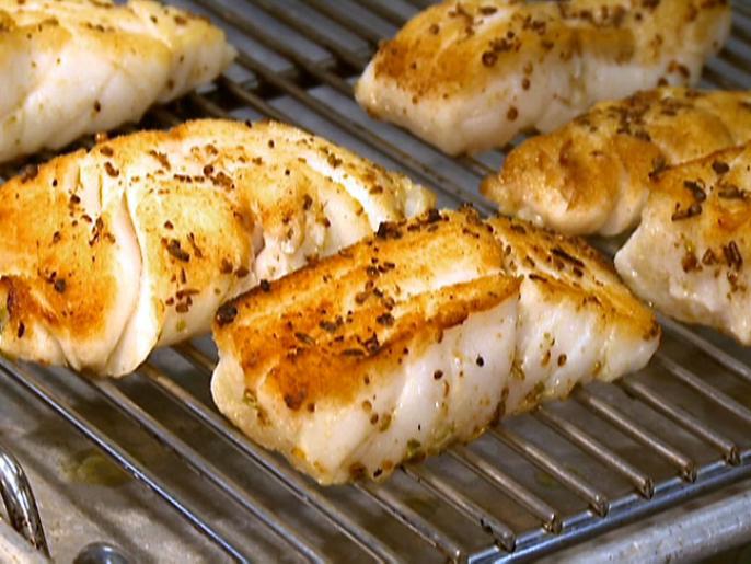 Curried Cod with Geel Rys (Yellow Rice with Raisins) Recipe | Food Network