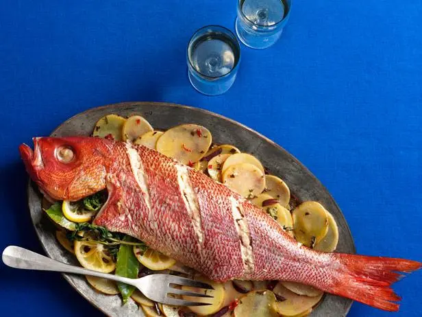 Whole Roasted Fish With Sliced Potatoes, Olives and Herbs Recipe - Chef ...