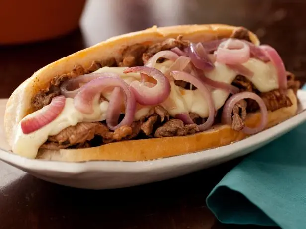 Philly Cheesesteaks with Melted Fontina and Sauteed Red Onions Recipe ...