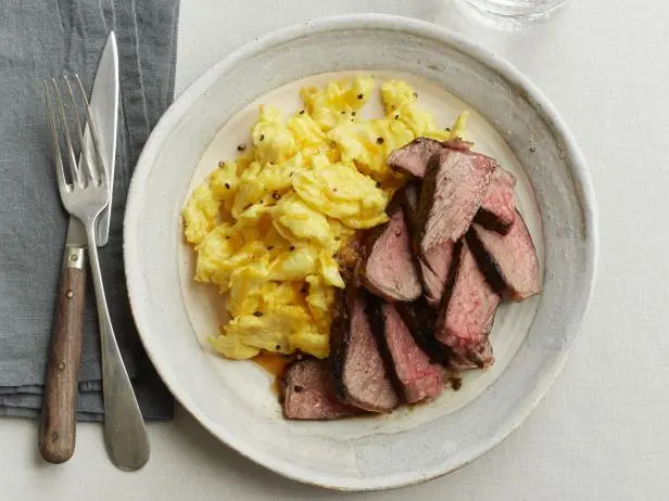 Rosemary Steaks with Cheesy Eggs Recipe | Sunny Anderson | Food Network