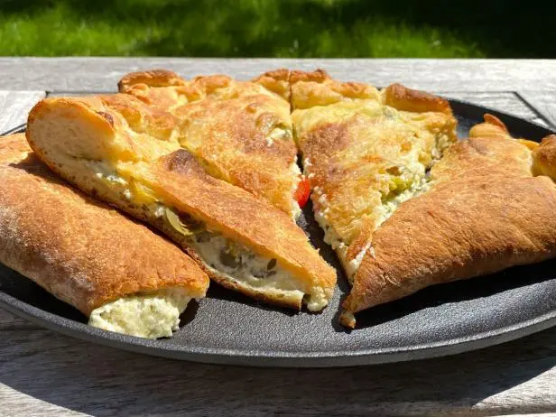 Three-Cheese Calzones Recipe | Michael Symon | Food Network