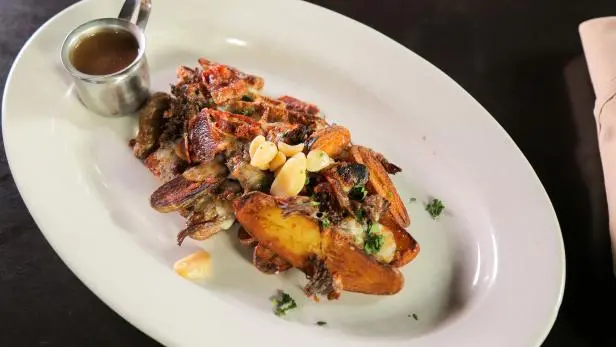 Fingerling Potato Poutine with Chile Braised Beef Recipe | Food Network