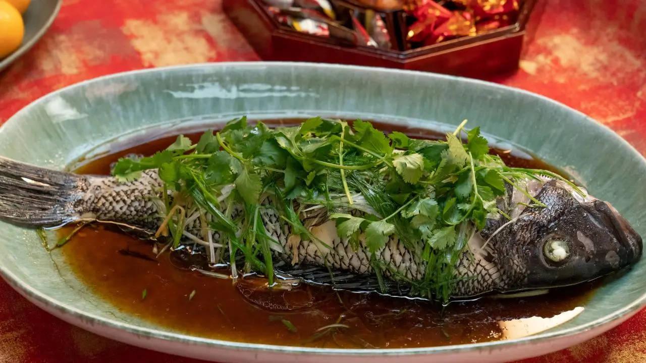 Steamed Fish with Seasoned Soy Sauce and Scallion Recipe | Food Network