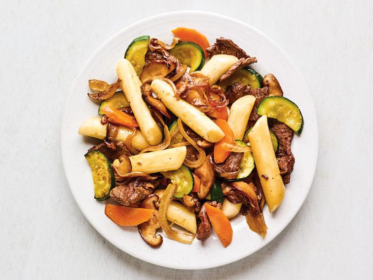 Korean Rice Cake Stir-Fry Recipe | Food Network Kitchen | Food Network