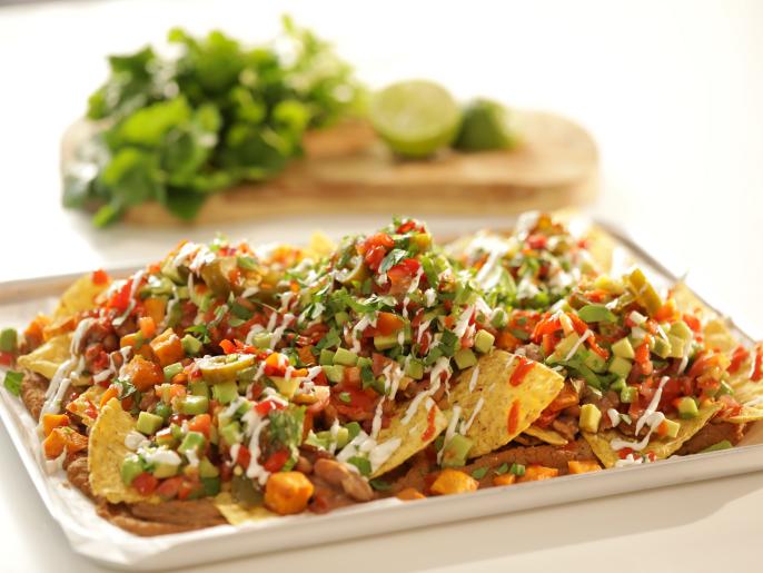 Towering Nacho Traybake Recipe | Food Network