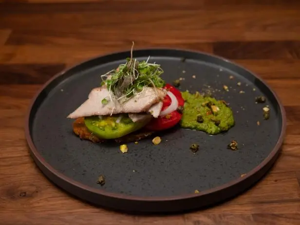 Tuna Confit with Heirloom Tomato Toast and Celery, Lovage and Pistachio ...