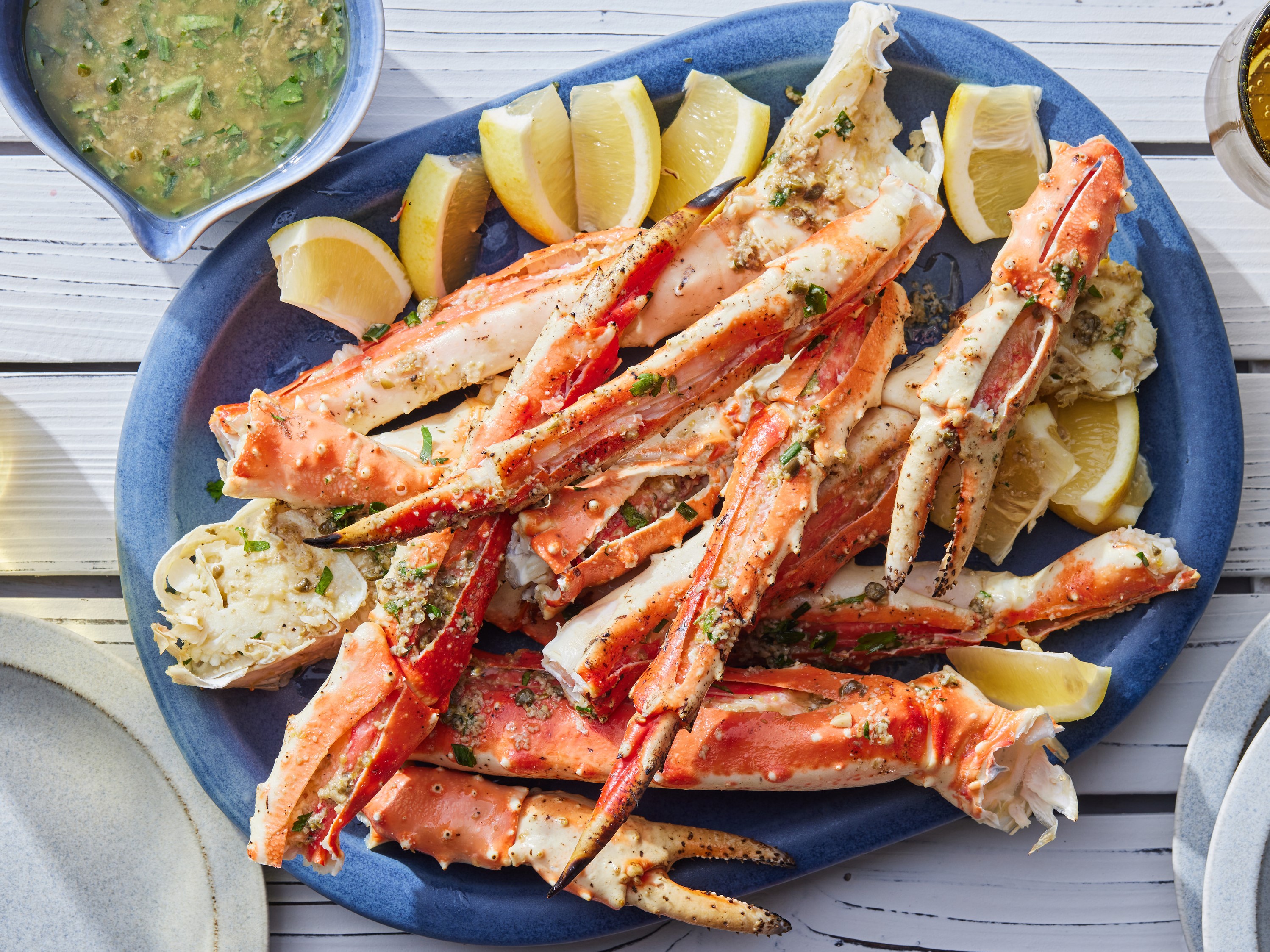 Grilled King Crab Legs with Caesar Butter Recipe - Chef's Resource Recipes