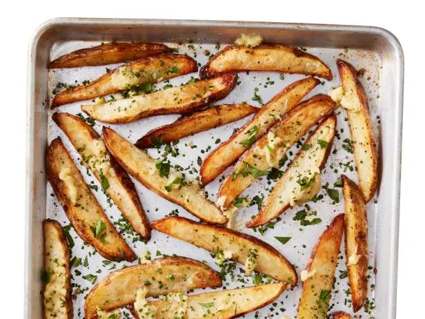 Butter-Garlic Oven Fries With Herbs Recipe | Jeff Mauro | Food Network