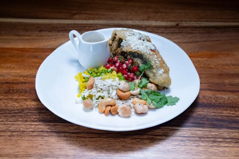 Maneet Chauhan Battles the Titans on 'Bobby's Triple Threat' | Food Network